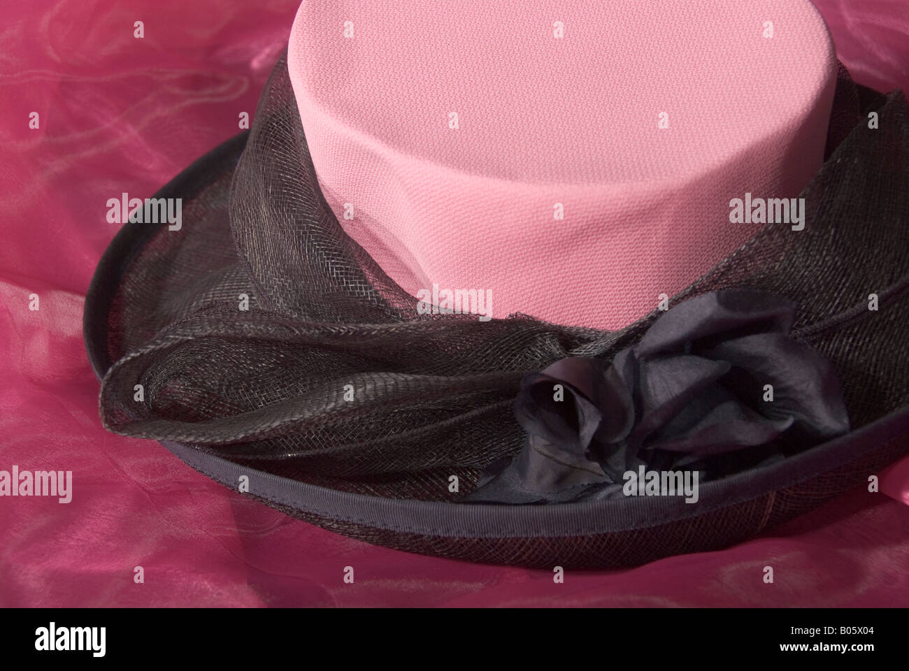 pink and black ladies formal hat with large bow Stock Photo - Alamy