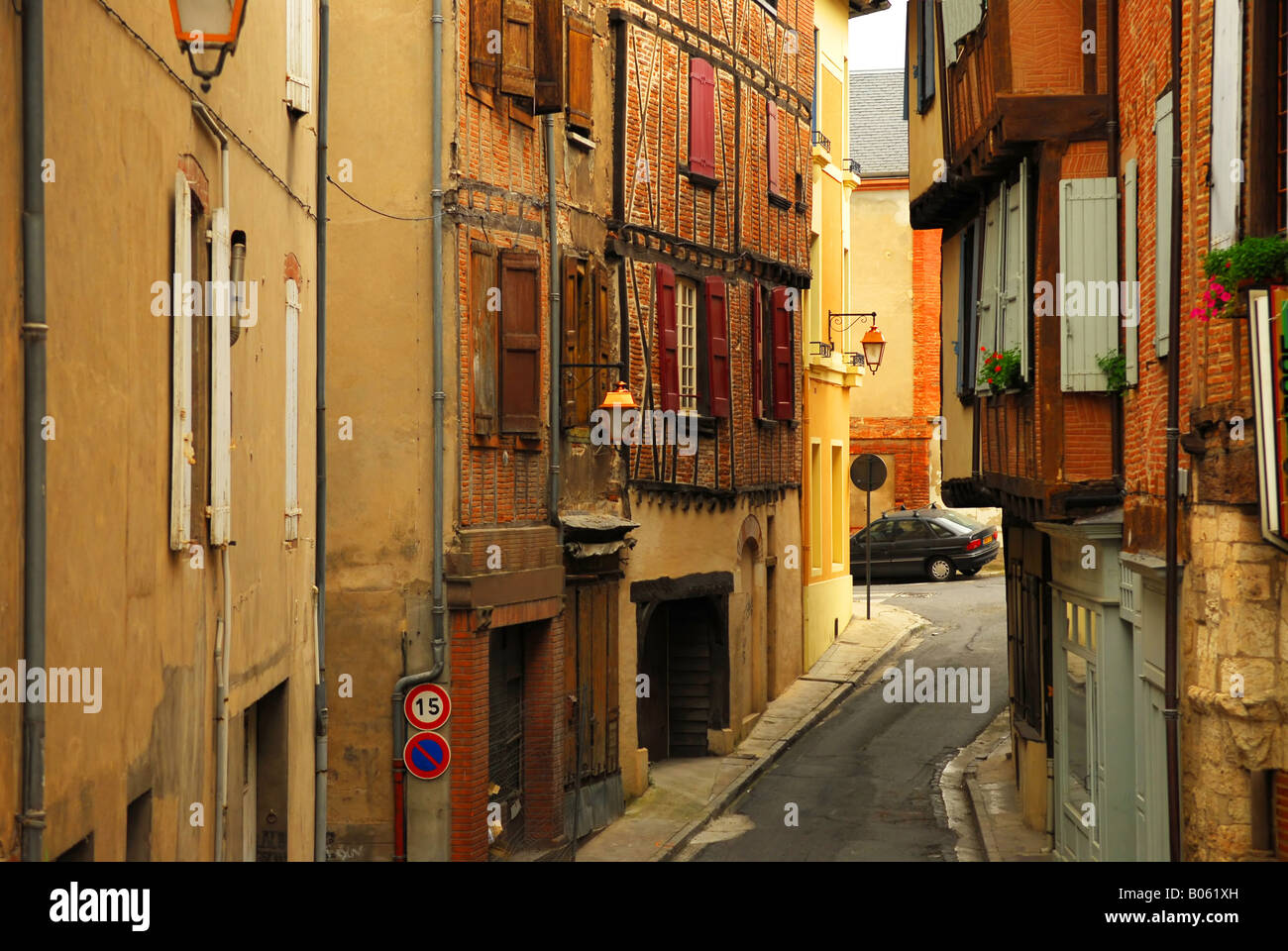 Narrow medieval street in town of Albi in south France Stock Photo - Alamy