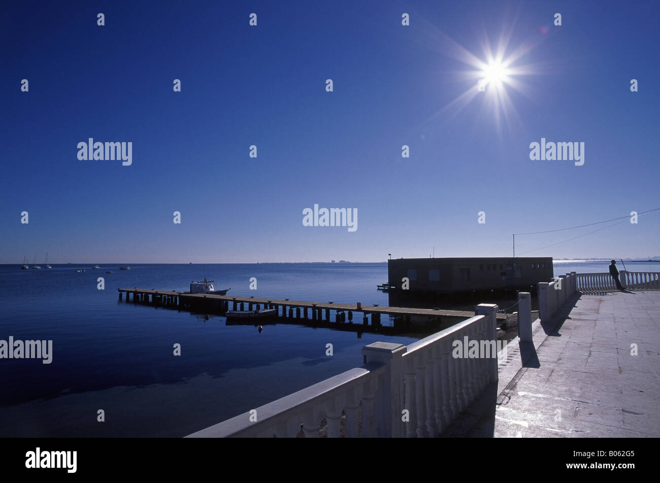 Mar Menor Santiago de la Ribera Promenade Jetty Sun in clear blue sky ...