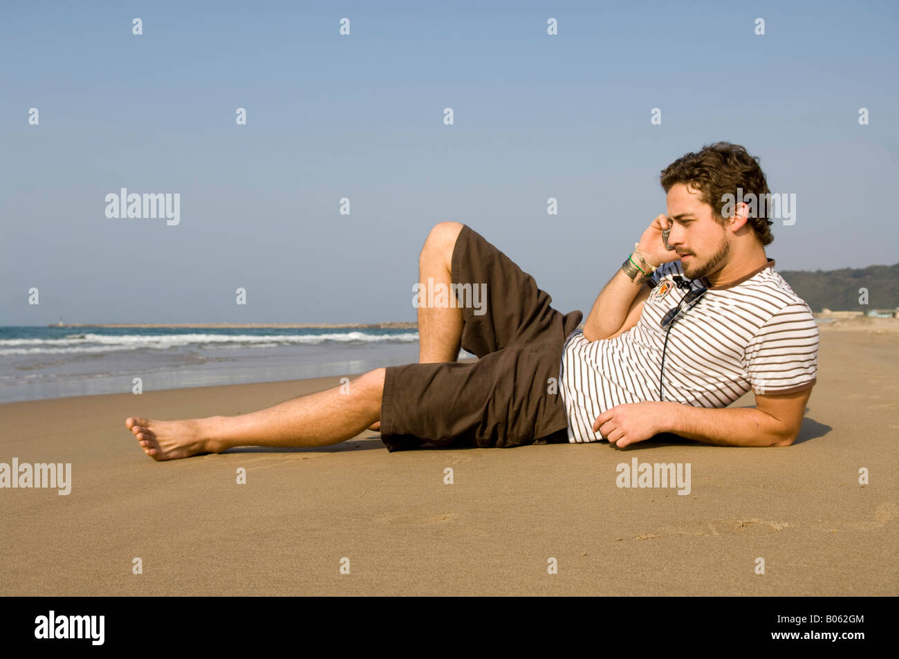 Phone call at the beach Stock Photo - Alamy
