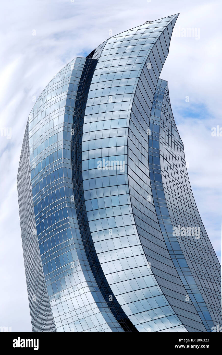 Distorted futuristic corporate building with glass walls reflecting ...