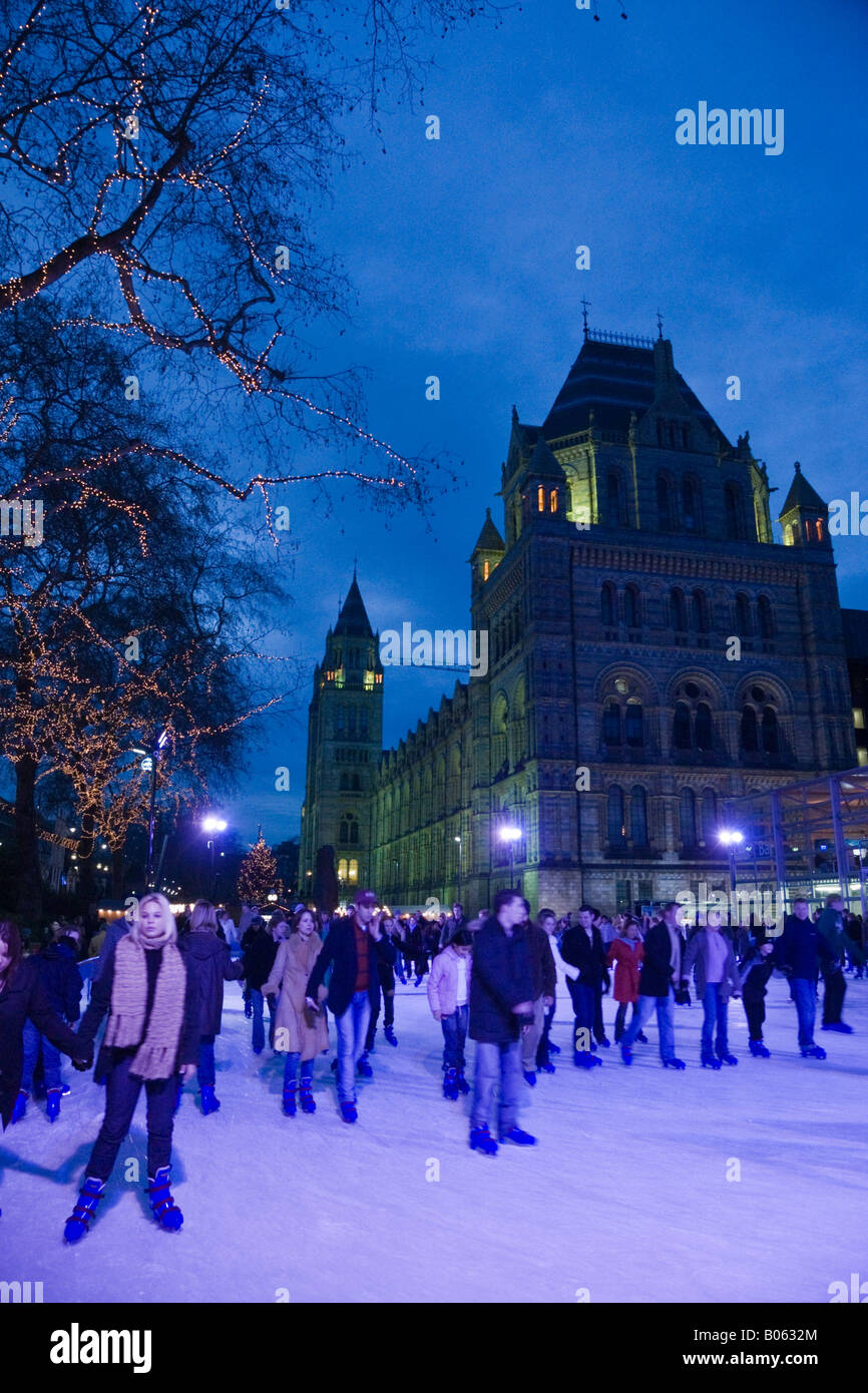 Natural History Museum London winter open air skating rink with people ...