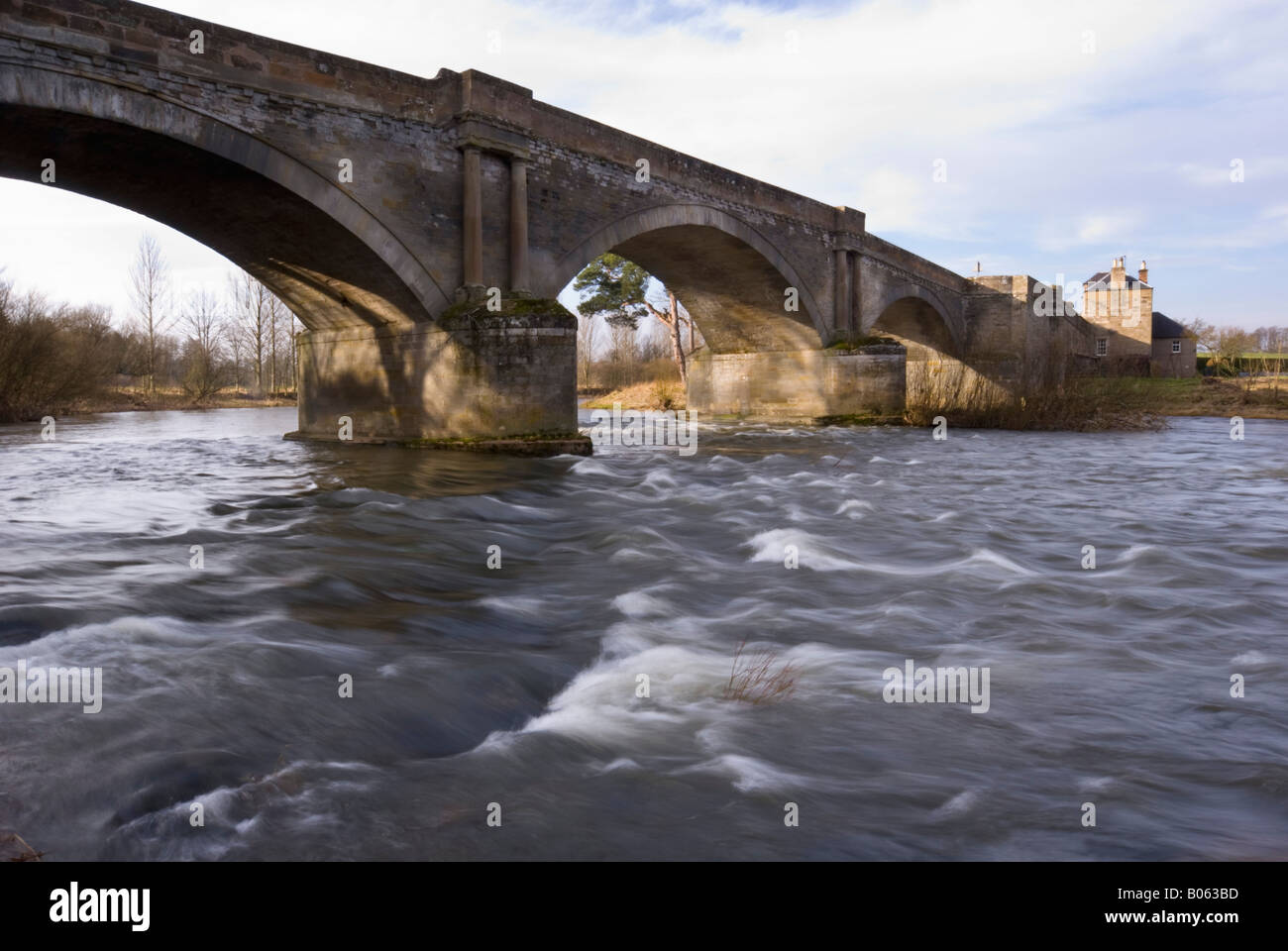 Kelso Scotland River Teviot the Teviot Bridge and toll house with fast ...
