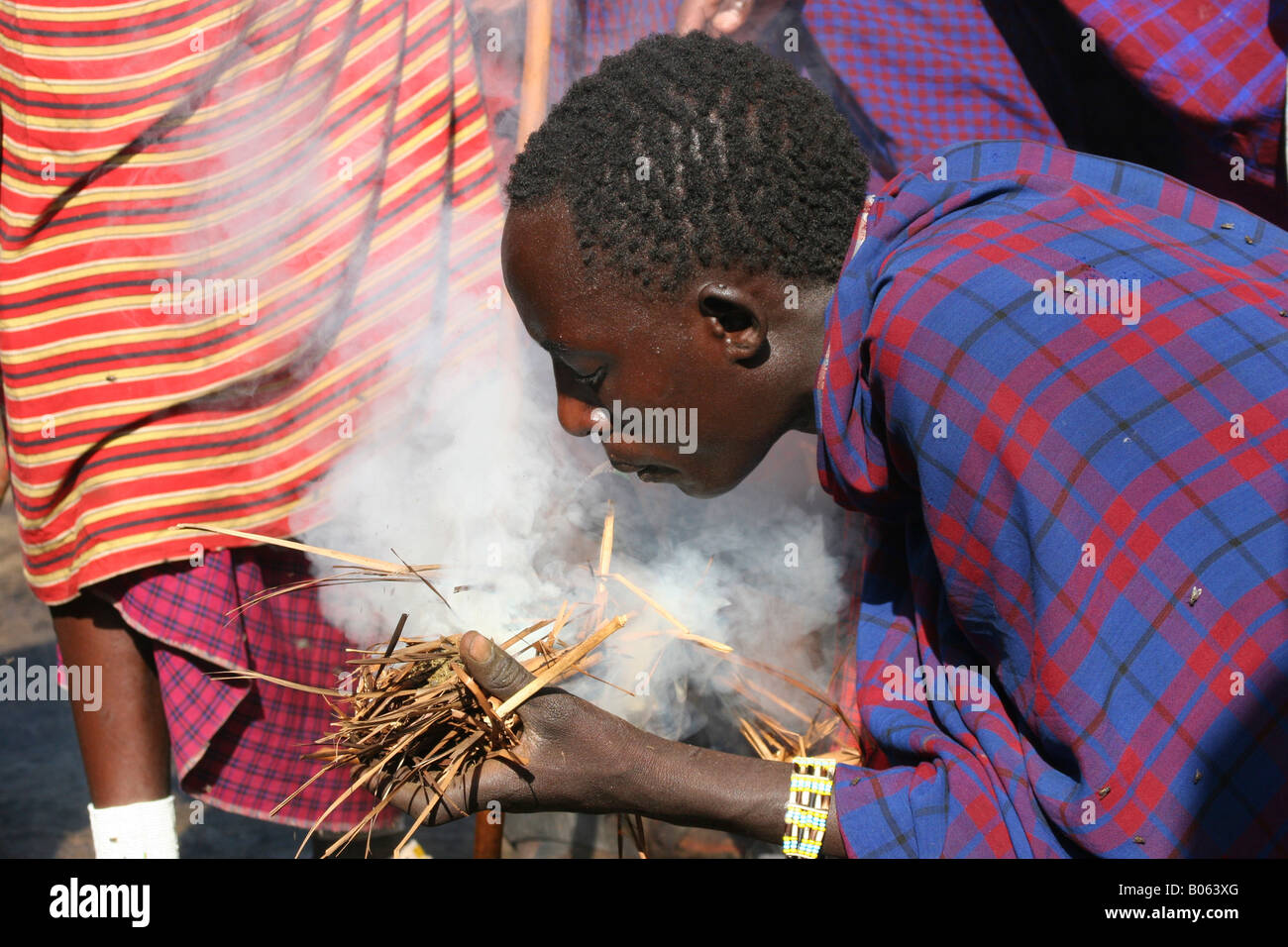 Masai lighting fire hi-res stock photography and images - Alamy