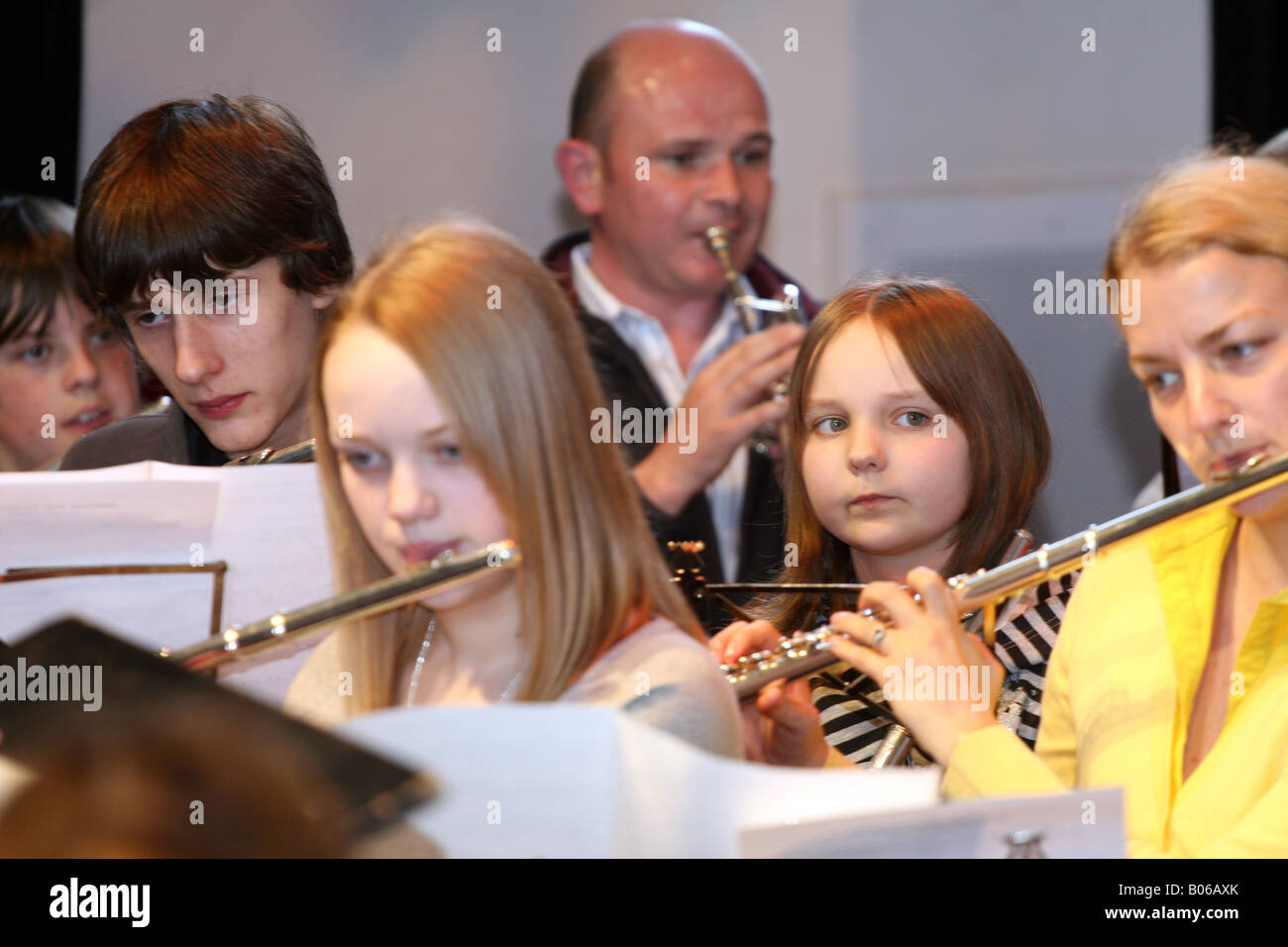 Portrait of a young girl flutist/flautist during a rehearsal Stock ...