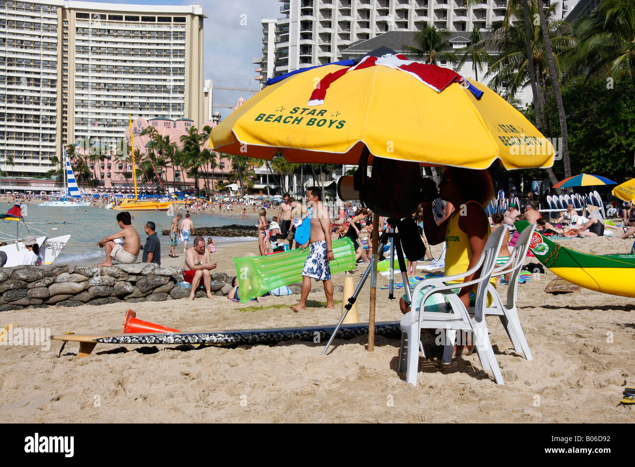 Photographer taking photographs of the 'beginners" surfing students in ...