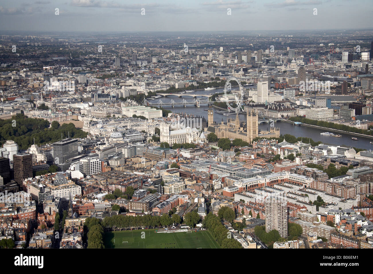 Aerial view north east of inner city buildings Westminster River Thames ...