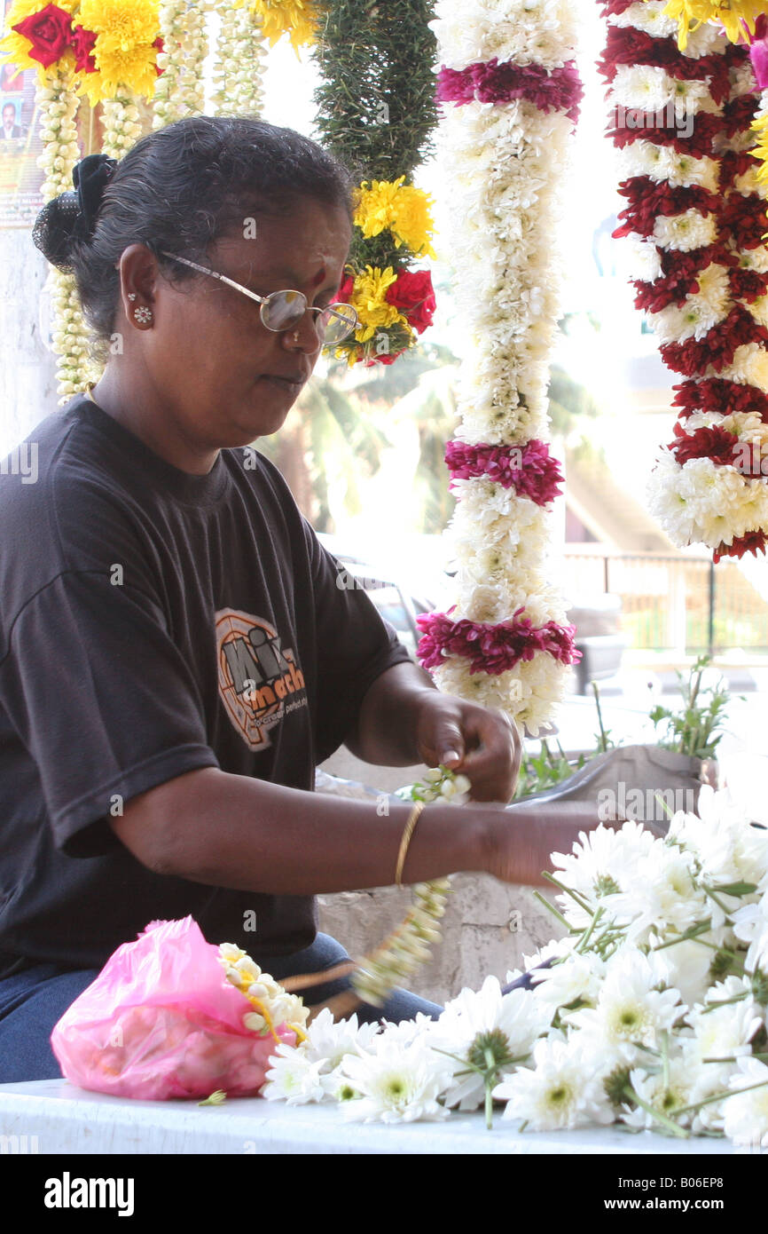 Indian female making garlands in Brickfields area of Kuala Lumpur Stock ...