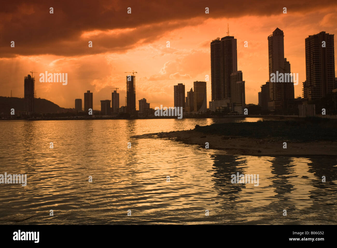 Panama, Panama City, Avenue Balboa buildings reflected in Panama Bay ...