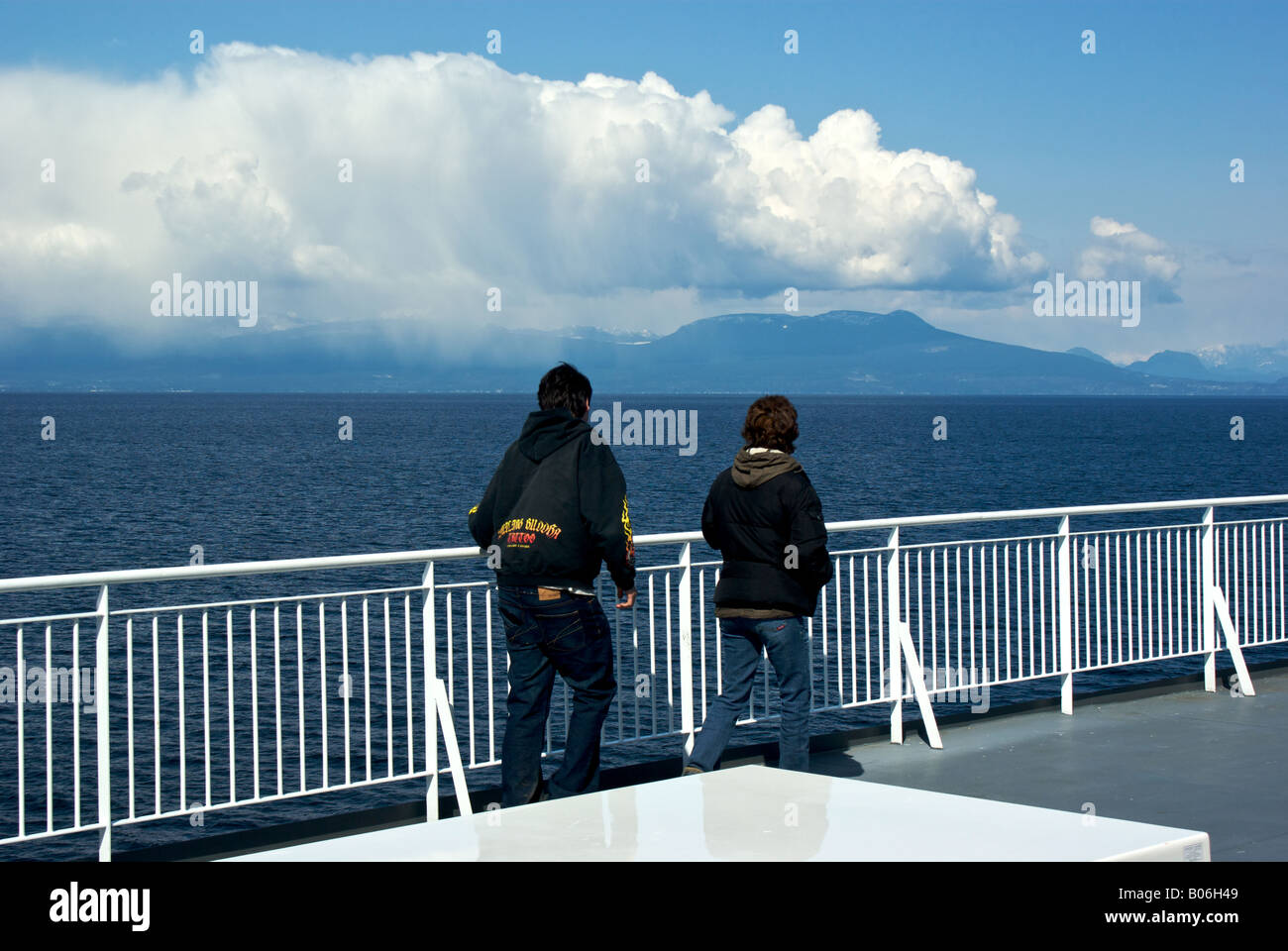Passengers enjoying a sunny sailing across Georgia Strait aboard the BC ...