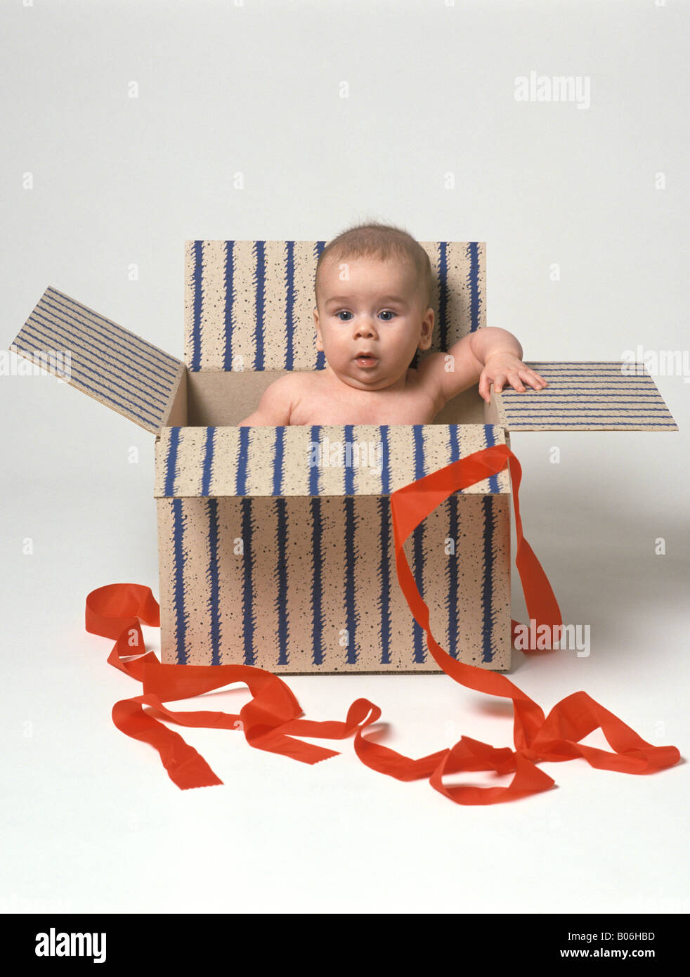 Child in a box hi-res stock photography and images - Alamy