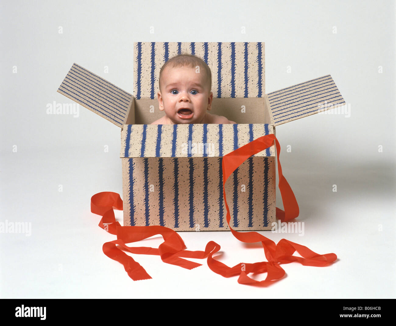 Child in a box hi-res stock photography and images - Alamy