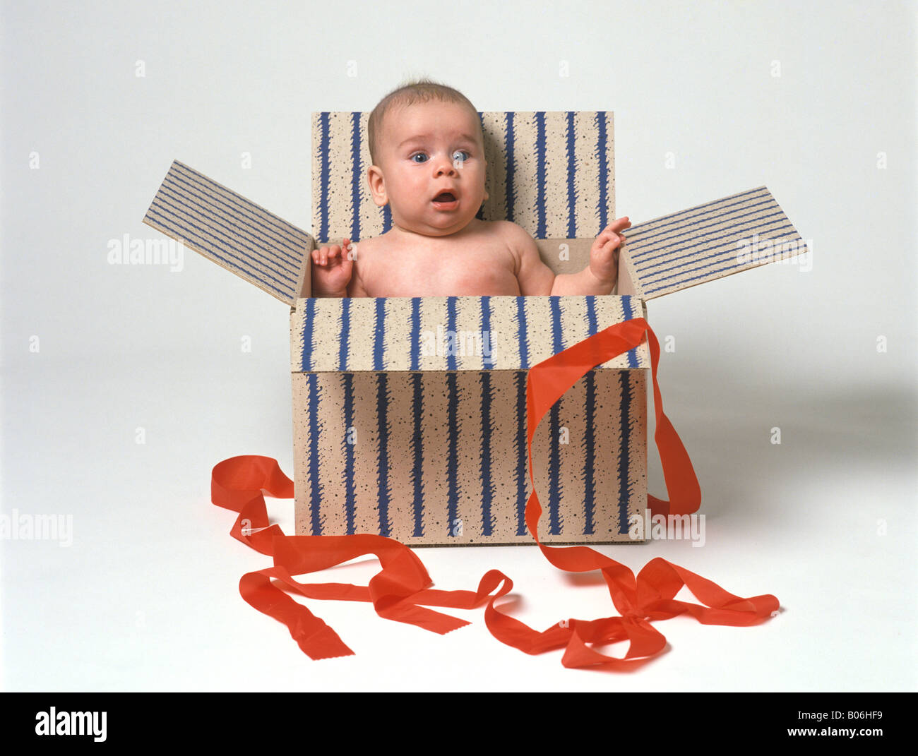 Baby in a gift box Stock Photo - Alamy