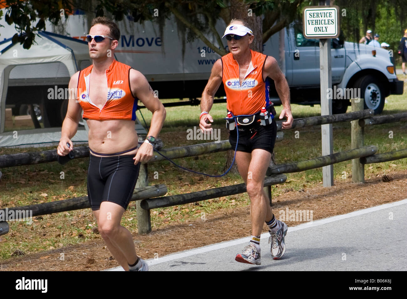 Sighted Triathlete Runner Leading a Blind Runner in the St Anthony's ...