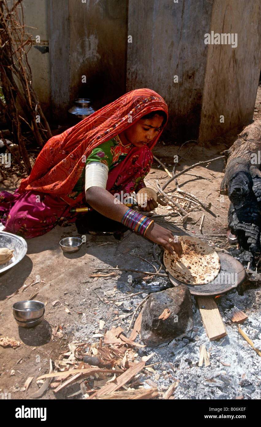 India Rann of Kutch Gujerat Nirona village young girl making chapati ...