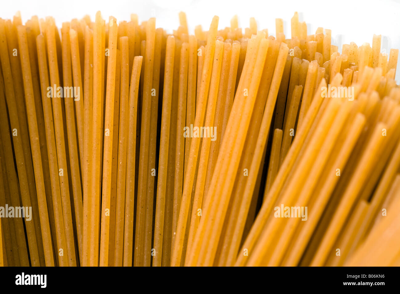 uncooked raw spaghetti background Stock Photo - Alamy