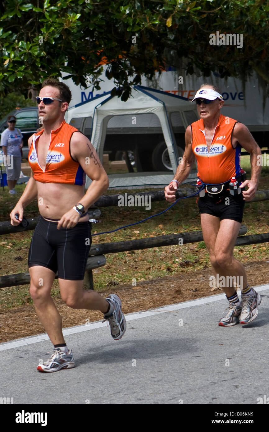 Sighted Triathlete Runner Leading a Blind Runner in the St Anthony's ...
