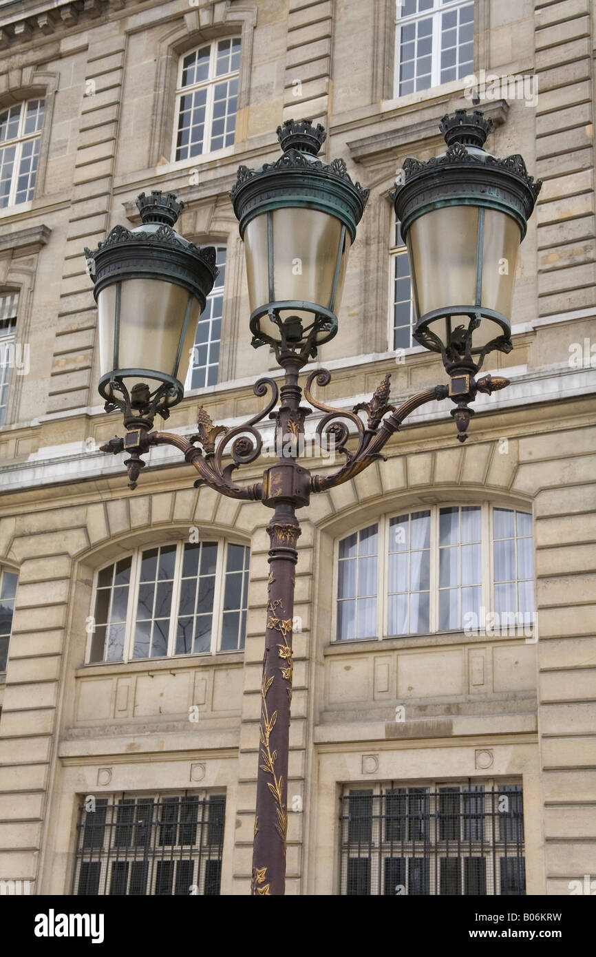 Ornate street light Paris France Stock Photo - Alamy