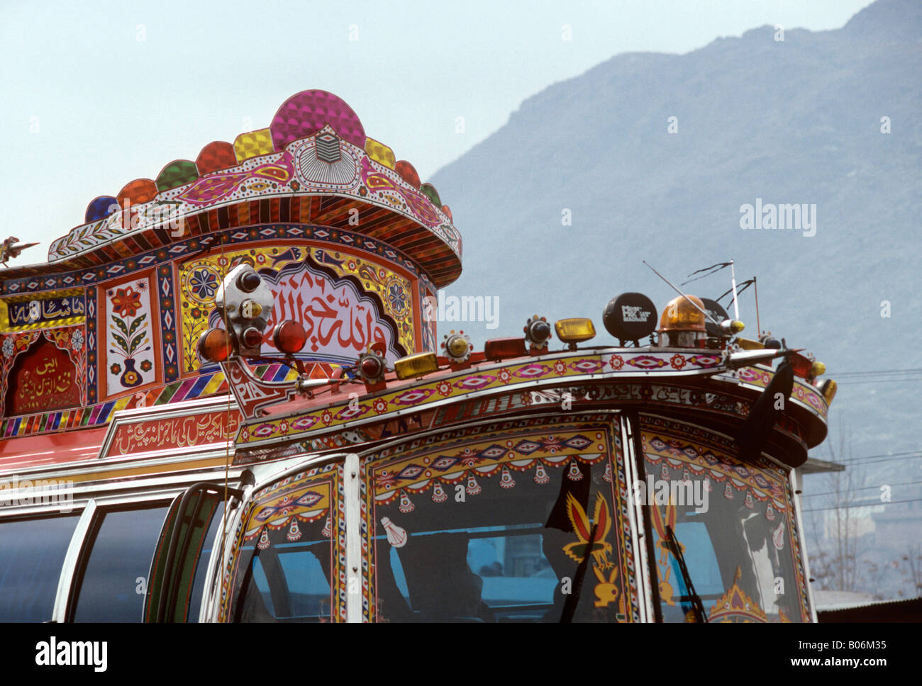 Pakistan Swat Valley Mingora top of decorated bus amongst mountains ...