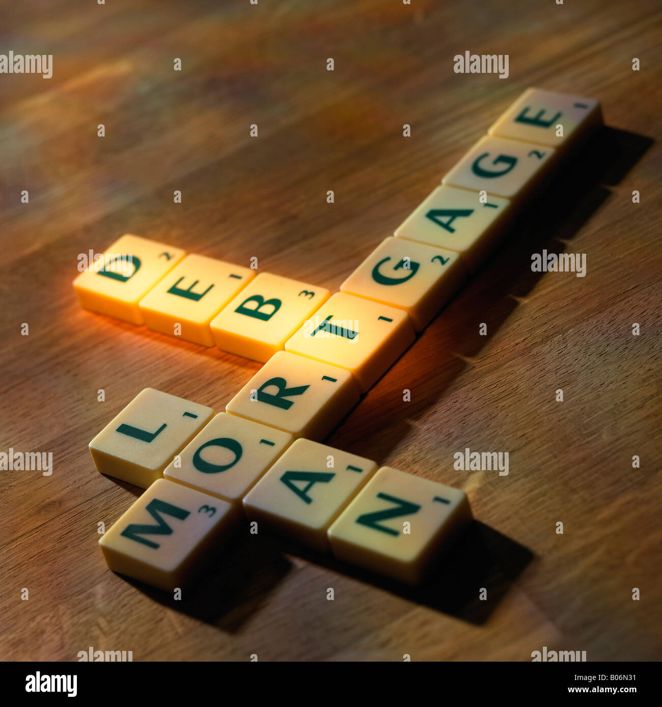 SCRABBLE LETTERS SPELLING THE WORDS MORTGAGE LOAN DEBT Stock Photo - Alamy