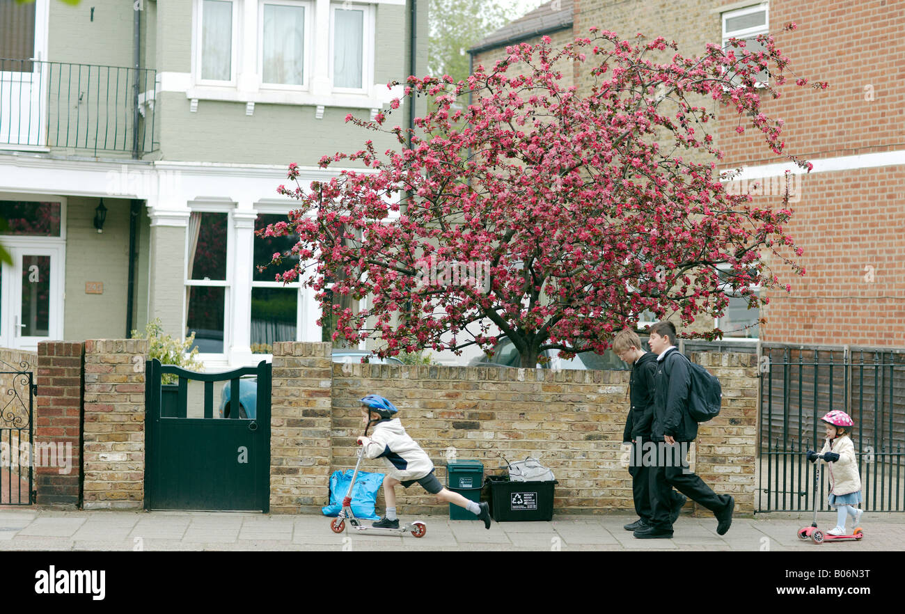 School pupils kids rushing school hi-res stock photography and images ...