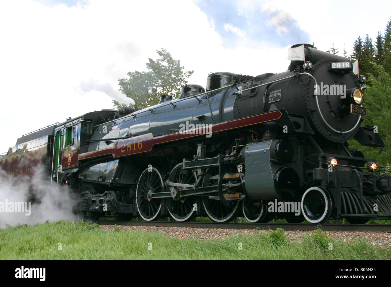 Steam train on a railroad track, Canadian National Railway, Alberta ...
