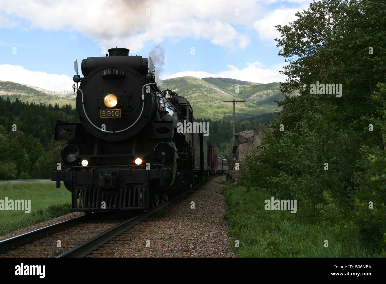 Steam train on a railroad track, Canadian National Railway, Alberta ...
