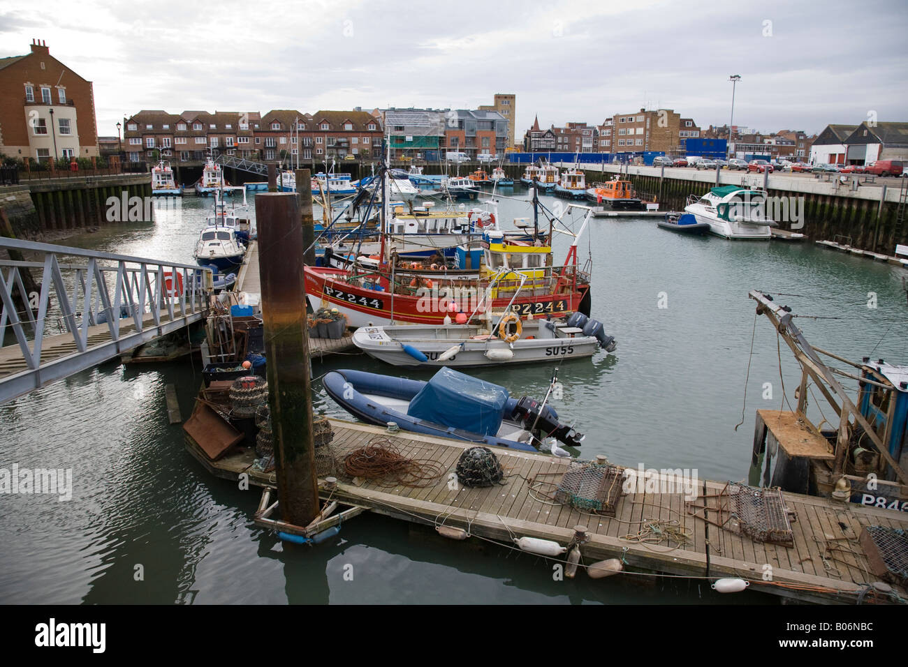 A mix of vessels moored in Camber Dock, Portsmouth, Hampshire, England ...