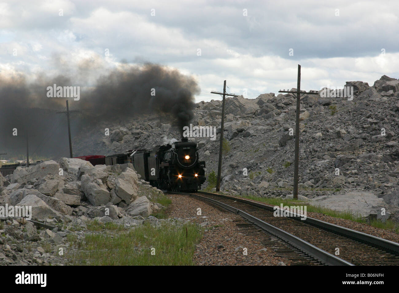 Steam train on a railroad track, Canadian National Railway, Frank Slide ...
