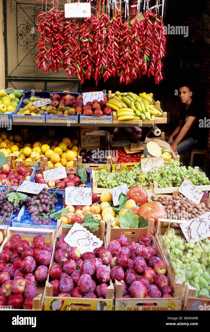 A vendor tends to his fruit stand in Sorrento, Italy Stock Photo - Alamy