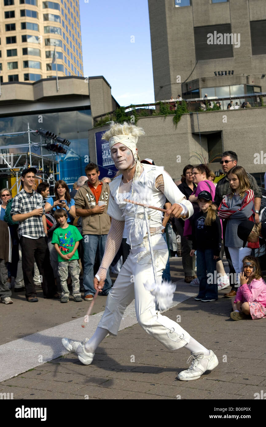 A juggler performs out in the open at the 2007 Montreal International ...