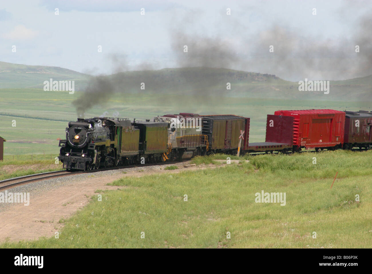 Steam train on a railroad track, Canadian National Railway, Alberta ...