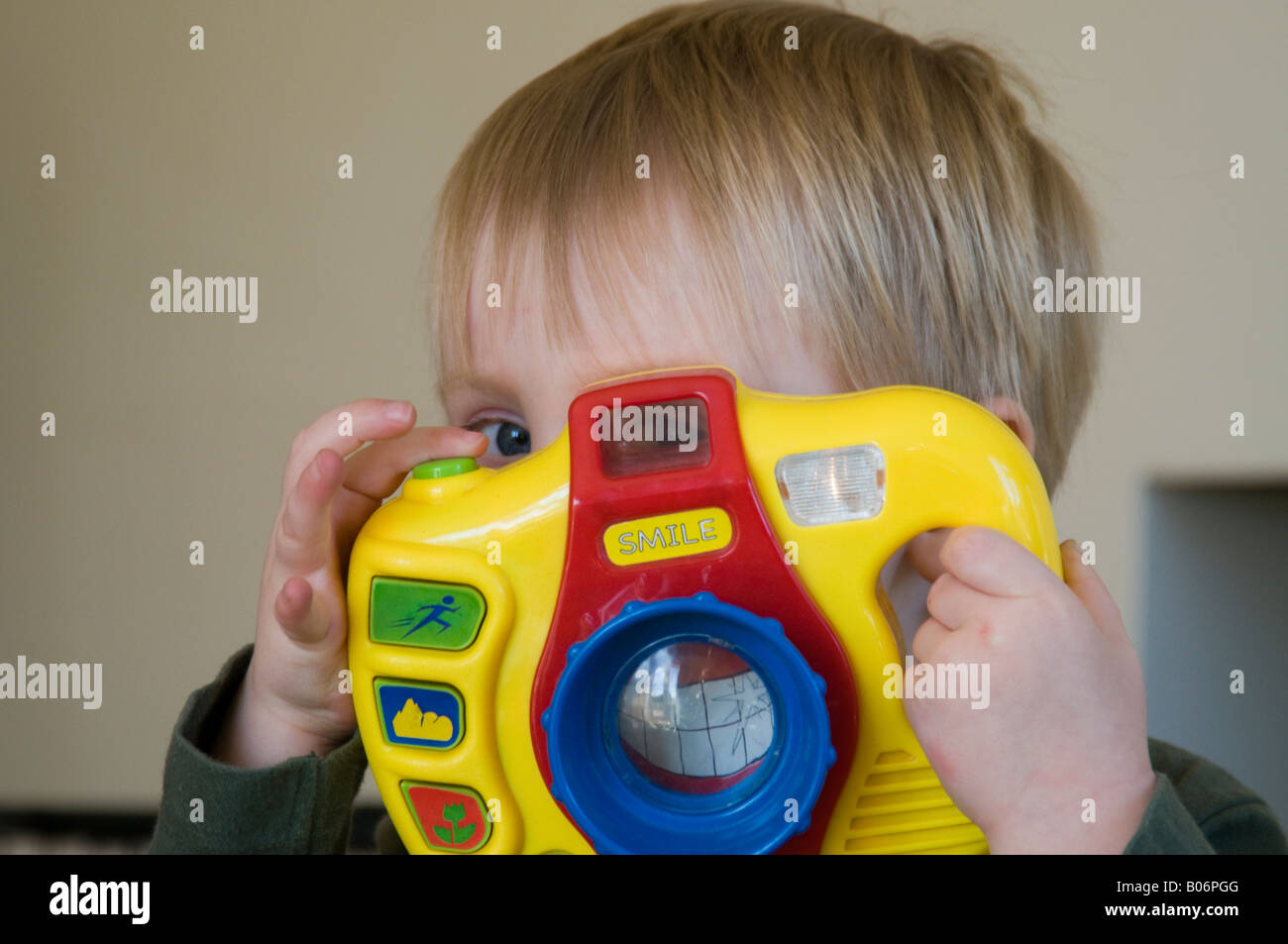 Small boy taking pictures with pretend camera Stock Photo - Alamy