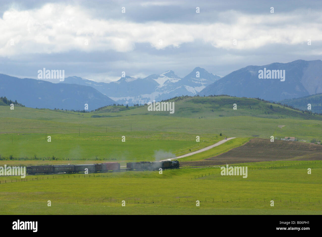 Steam train on a railroad track, Canadian National Railway, Alberta ...
