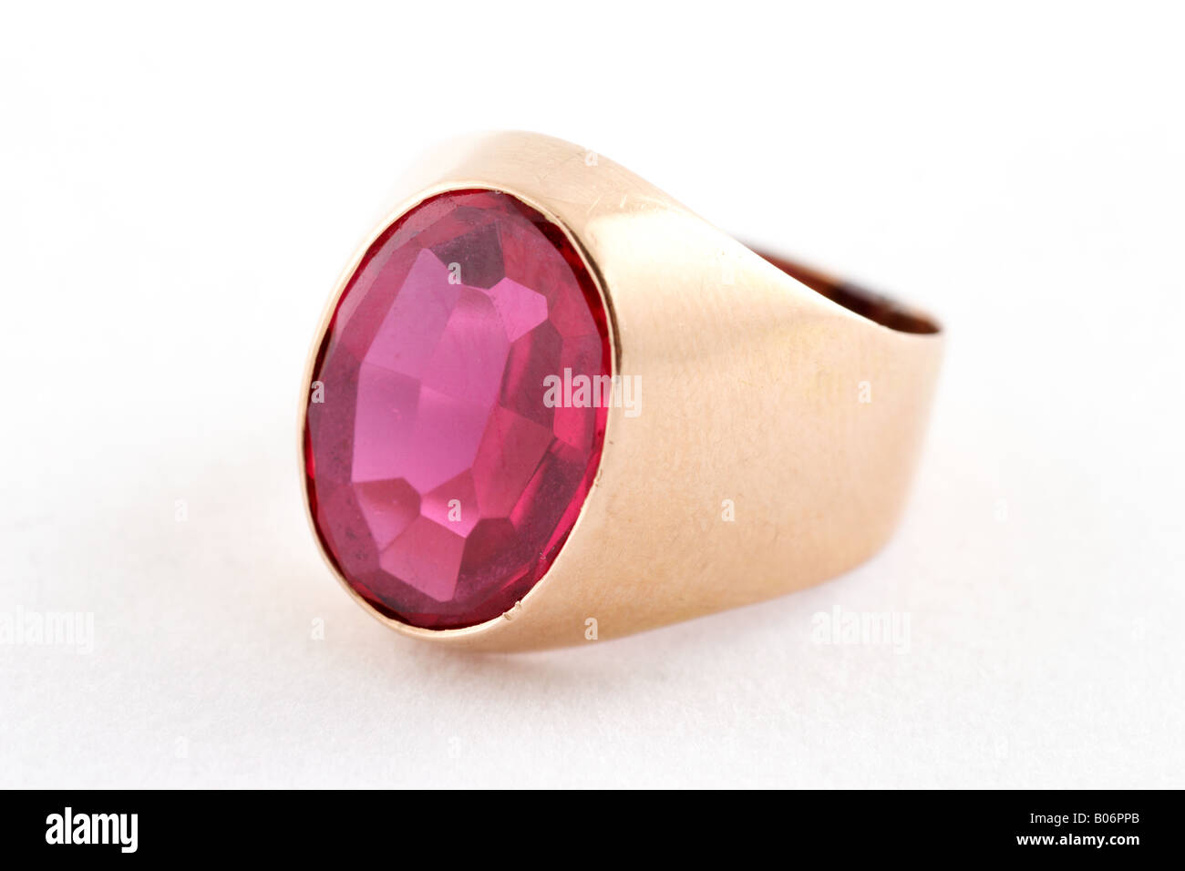 golden signet on white background Stock Photo - Alamy