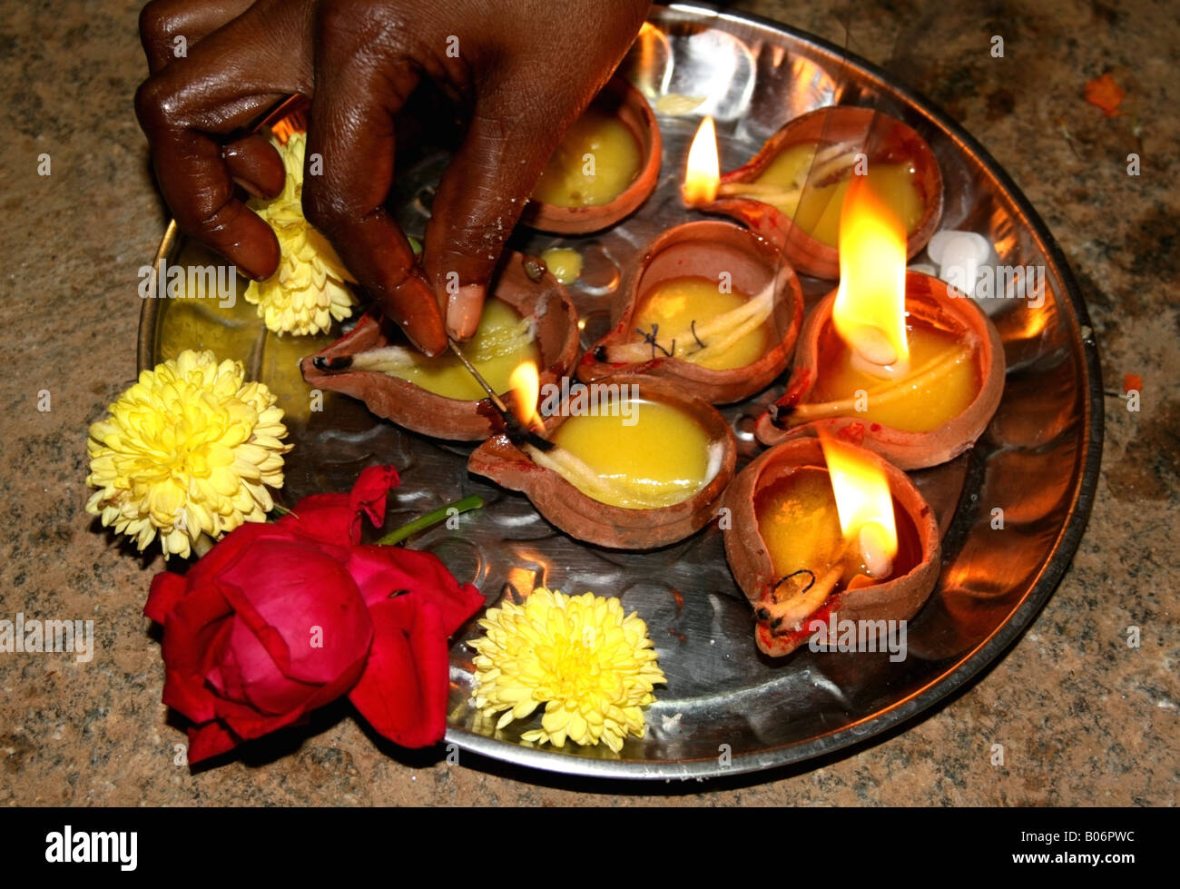 Ghee lamps hi-res stock photography and images - Alamy