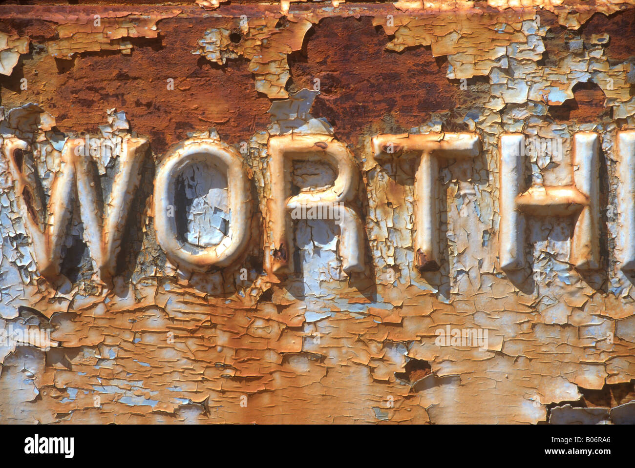 Peeling paint and rust on the side of a metal sign Stock Photo - Alamy