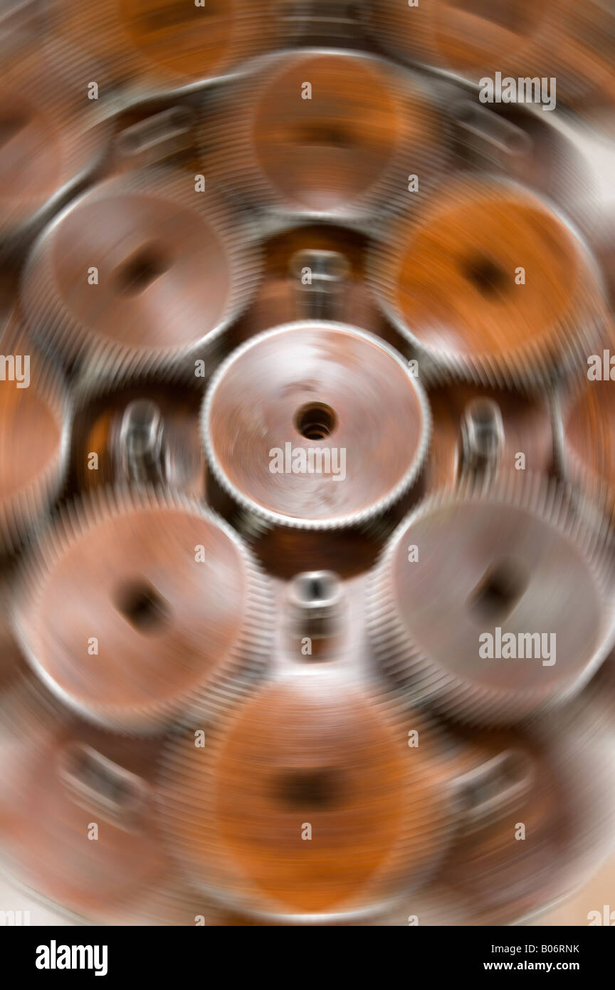 Gears move around a stationary cog wheel with steel teeth Stock Photo ...