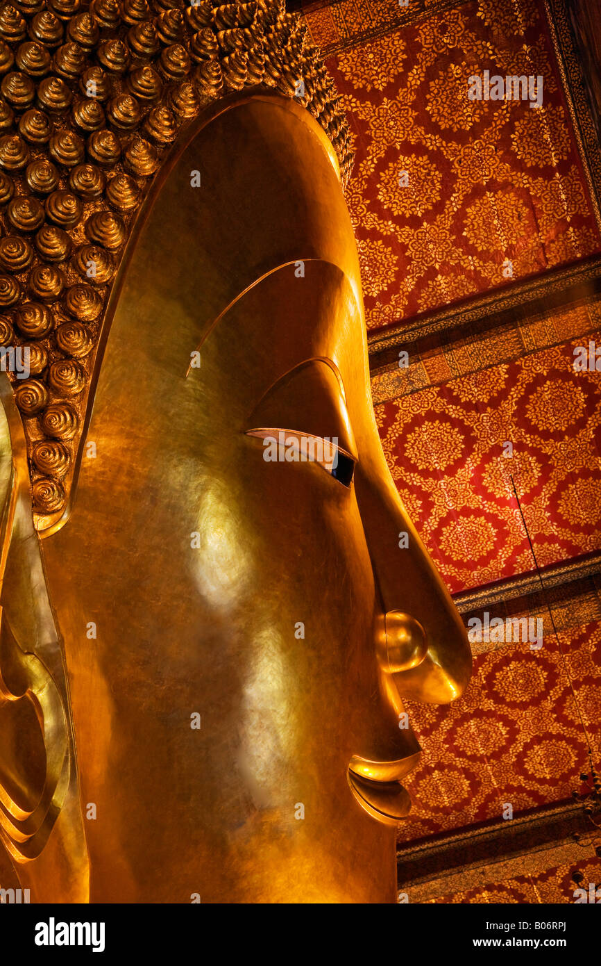 The gilded FACE of the largest RECLINING BUDDHA in THAILAND at the ...