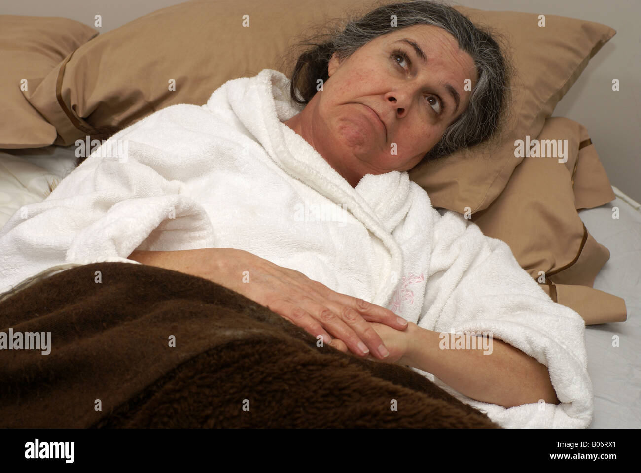 Woman lying dead on bed hi-res stock photography and images - Alamy