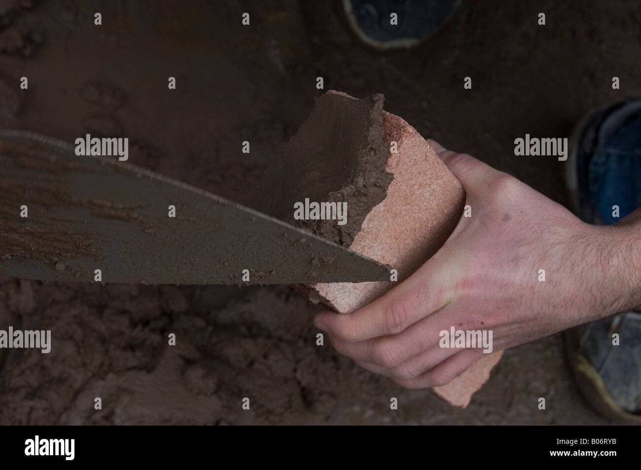 DIY How to build a brick wall Stock Photo - Alamy