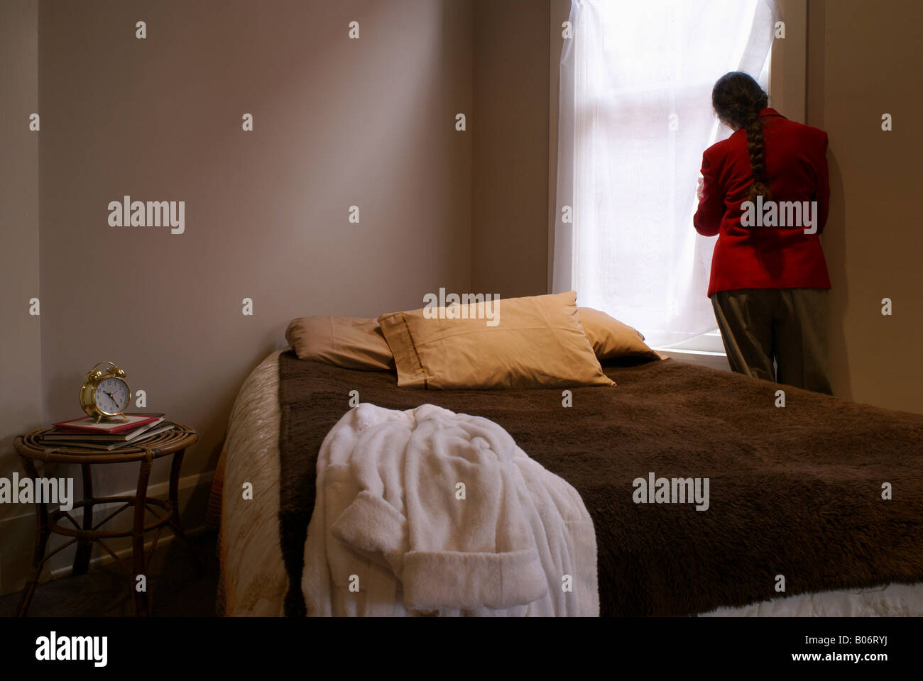 Looking out window Stock Photo - Alamy