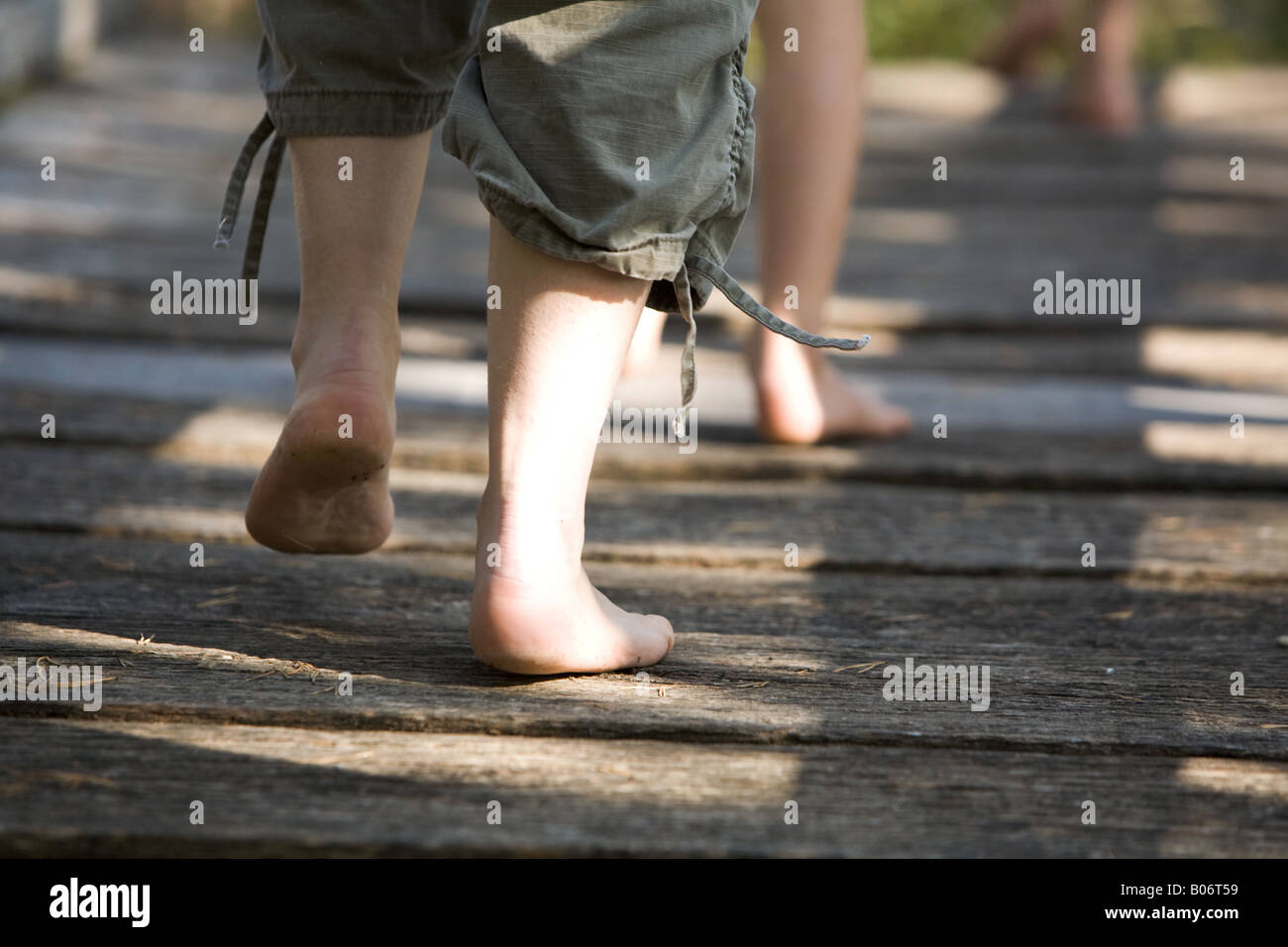 Feet of a boy Stock Photo - Alamy