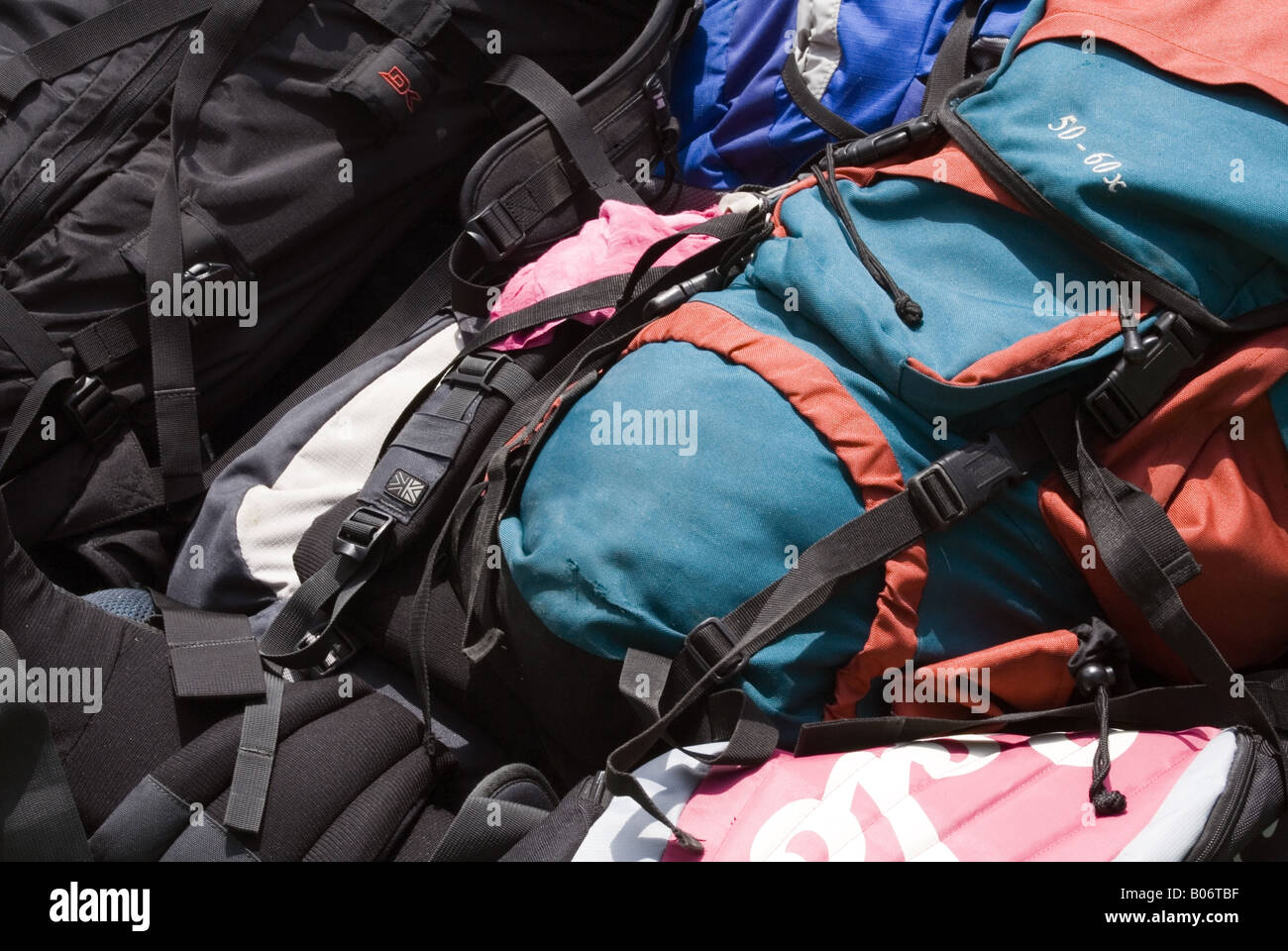 Pile of colourful backpacks Stock Photo - Alamy