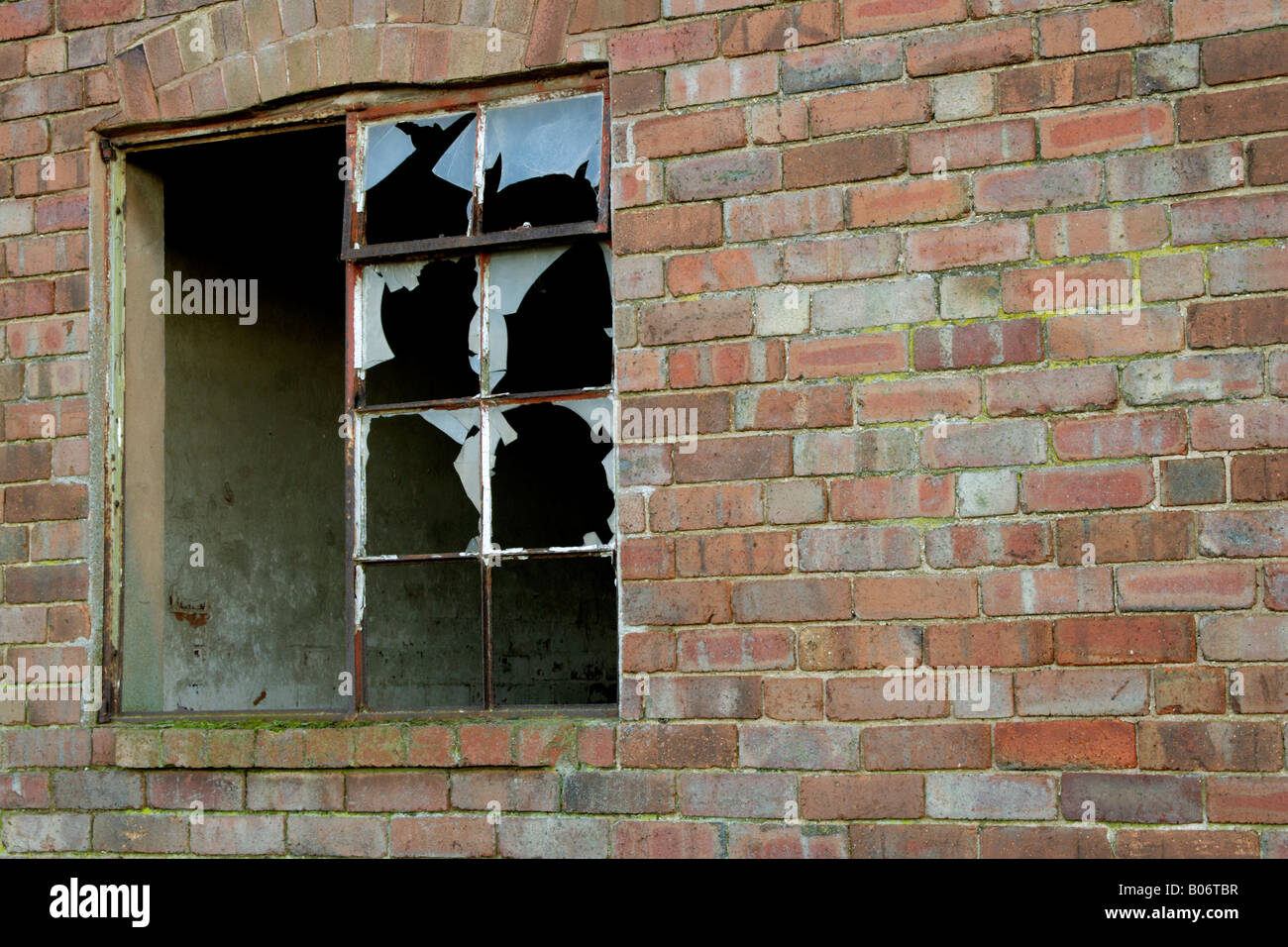 Smashed window from old abandoned farm building England UK Stock Photo - Alamy