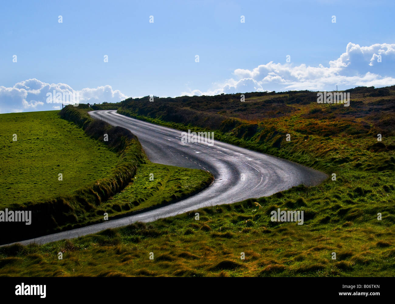 Rural road bend hi-res stock photography and images - Alamy