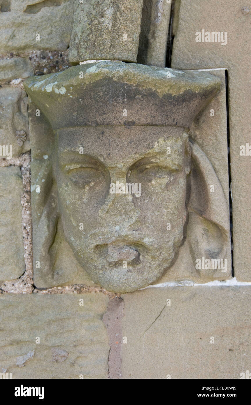 Carved head at entrance to Swinton Church Stock Photo - Alamy