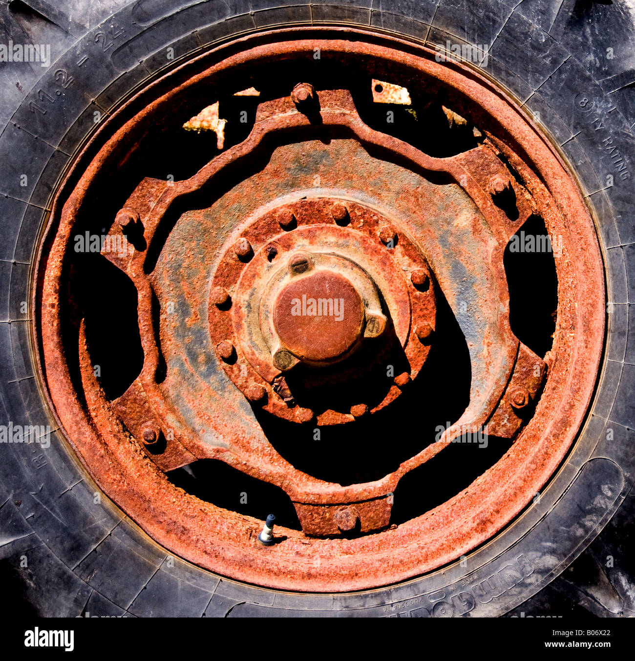 Rusty wheel with a tyre BHZ Stock Photo - Alamy
