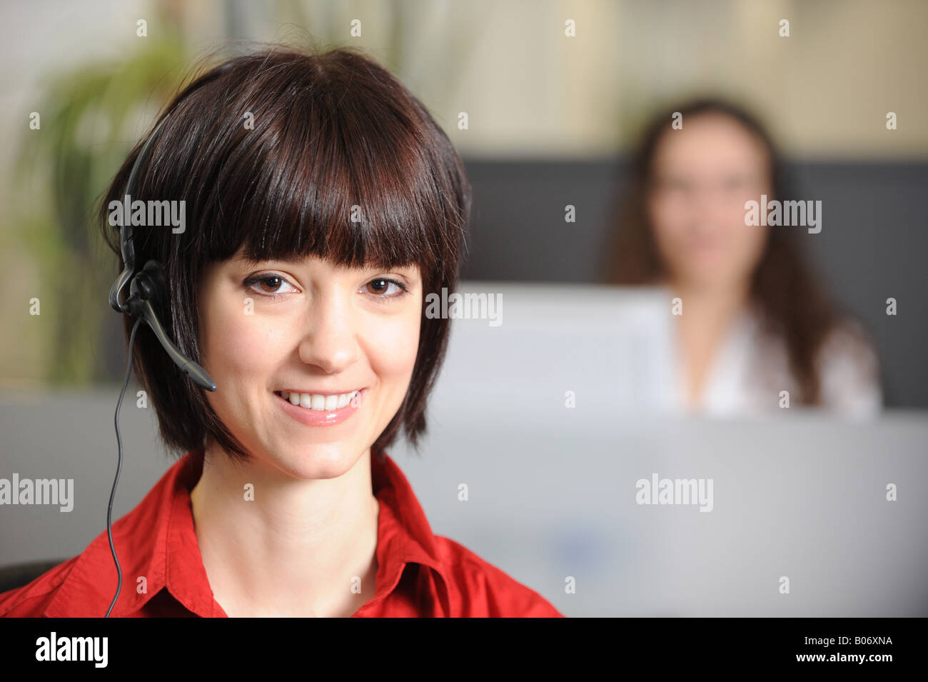 woman working in a call center Stock Photo - Alamy