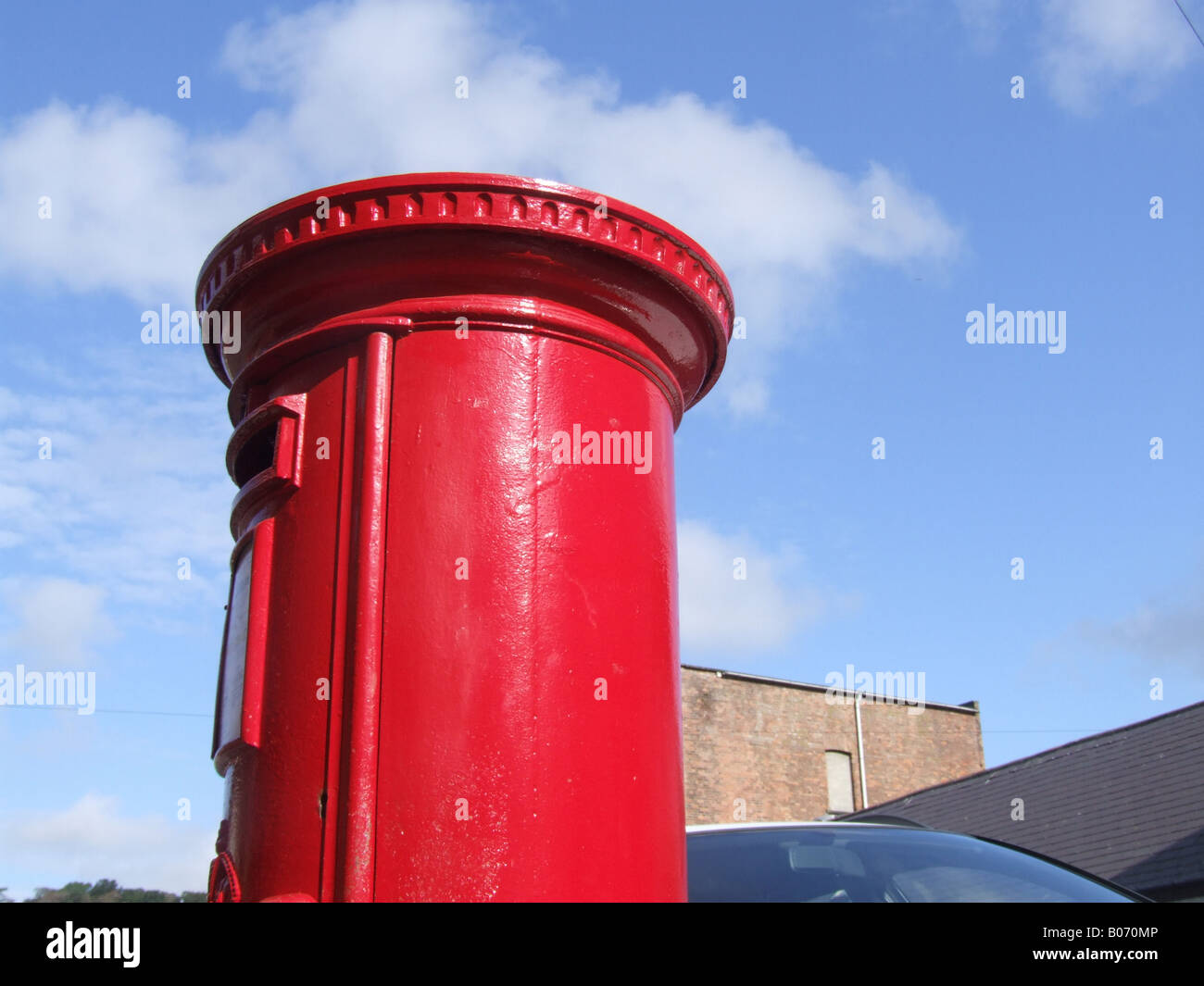 red post box in britain Stock Photo - Alamy